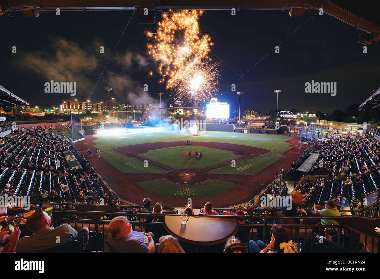Winston-Salem, NC: Fans enjoy the fireworks following an MiLB game on ...