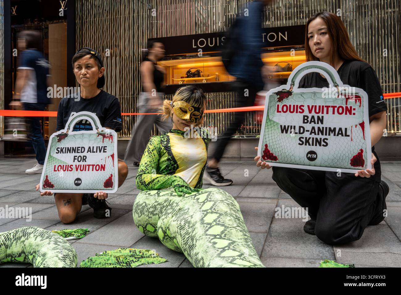 PETA protest outside Louis Vuitton in Hong Kong A demonstrator dress in ...