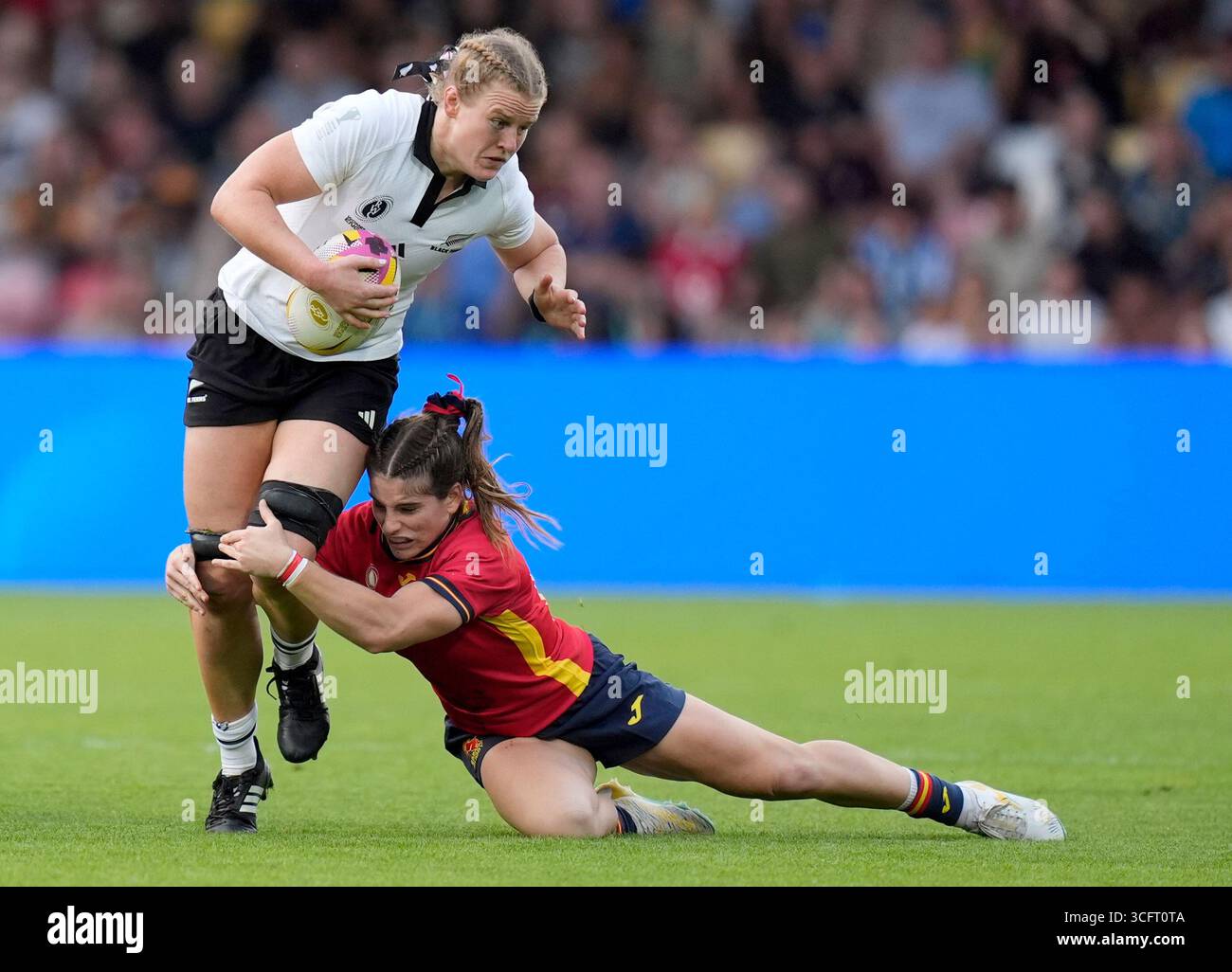 New Zealand's Laura Bayfield is tackled by Spain's Claudia Pena during ...