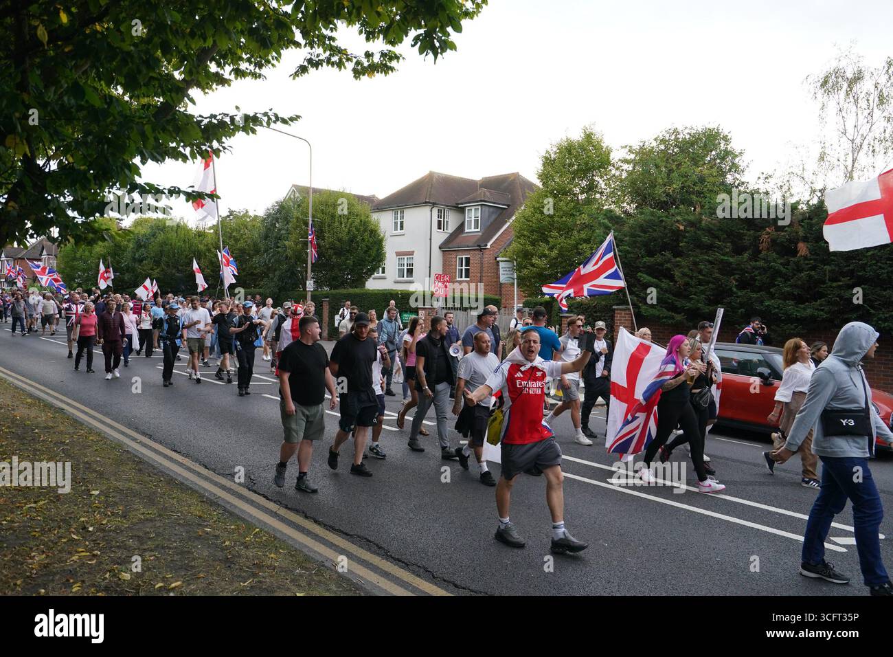 People demonstrating under the Abolish Asylum System slogan outside the ...