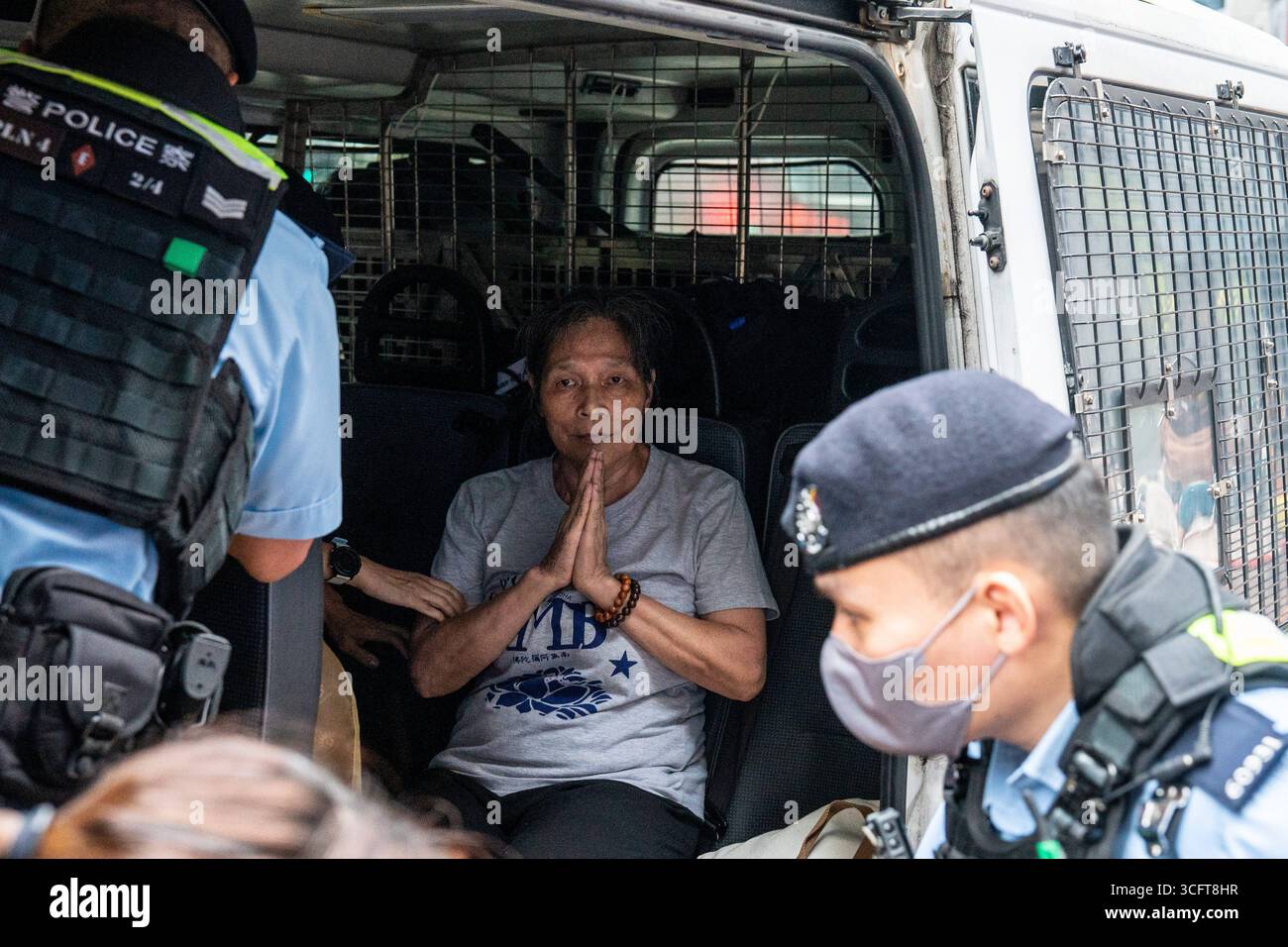 Hong Kong on June 4 Police escorting activist Liu Yuk Lin to a police ...