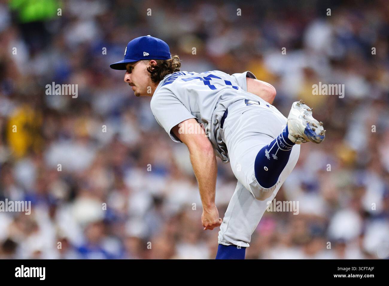 Los Angeles Dodgers' Justin Wrobleski follows through on a pitch ...