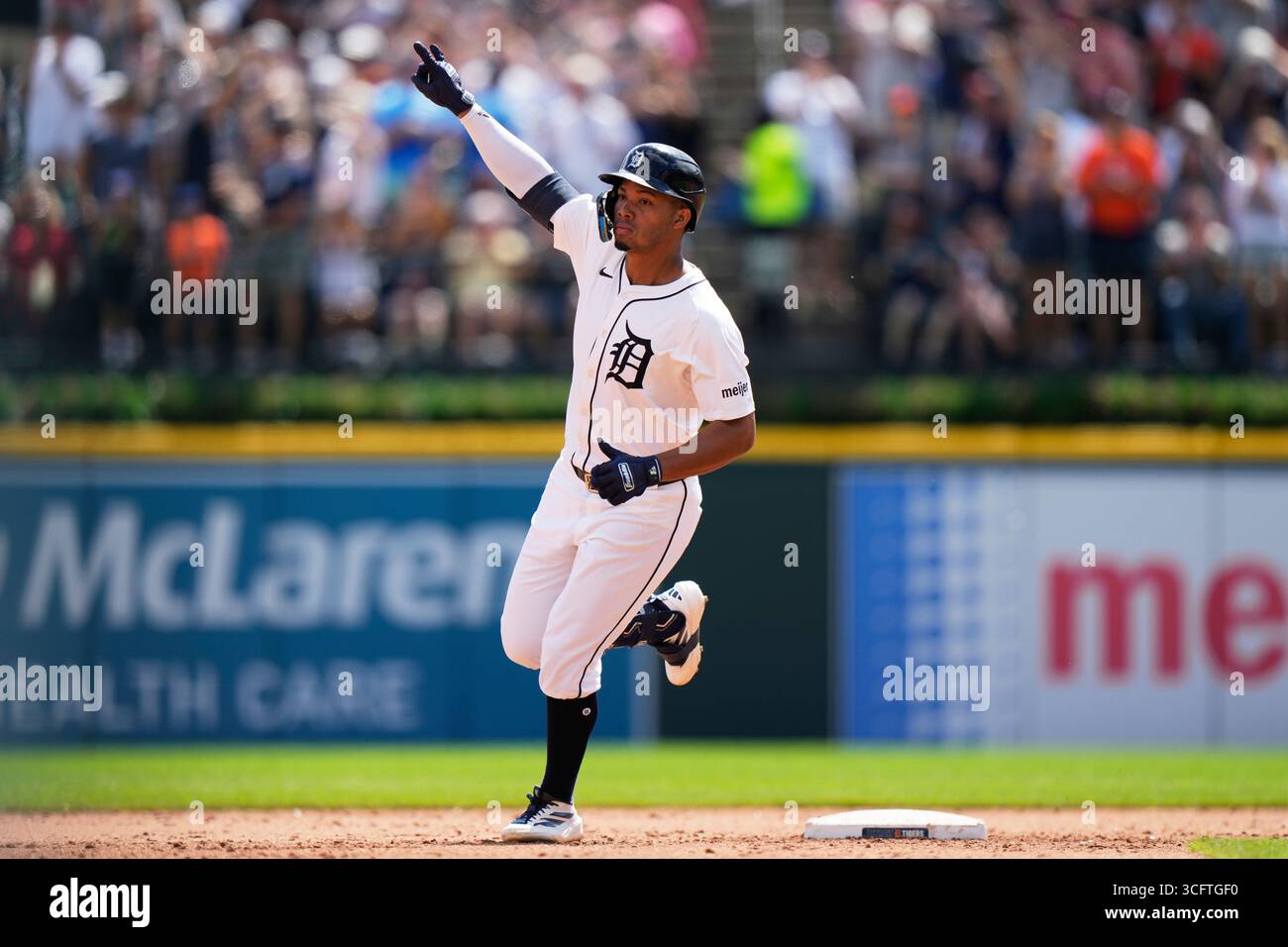 Detroit Tigers' Wenceel Perez gestures while running the bases after ...