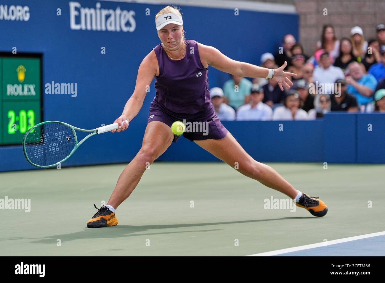Clara Tauson, of Denmark returns a shot to Alexandra Ella, of the ...