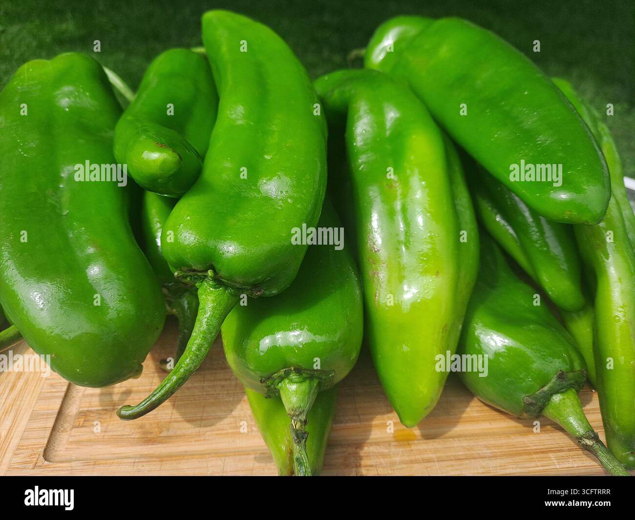 Fresh Hatch Green Chili's lightly oiled Stock Photo - Alamy