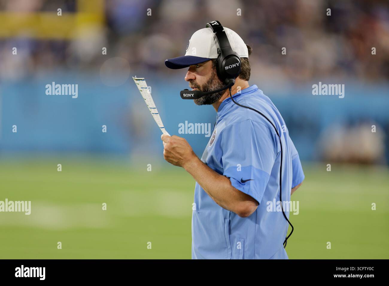 Tennessee Titans head coach Brian Callahan calls in a play during the ...