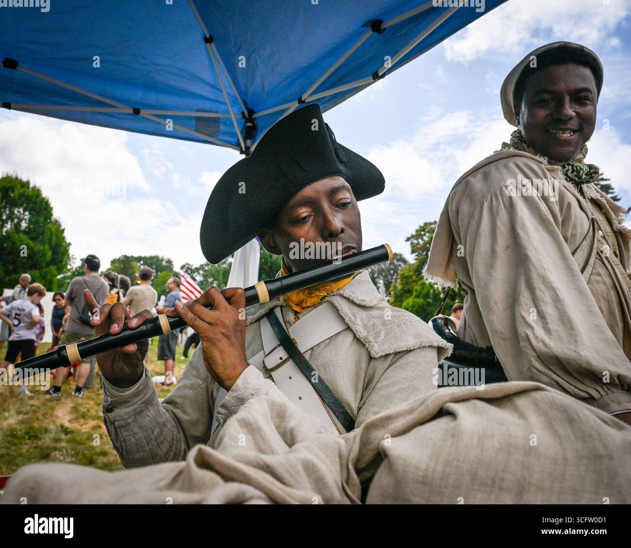 New York, USA. 24th Aug, 2025. Revolutionary War reenactors portraying ...
