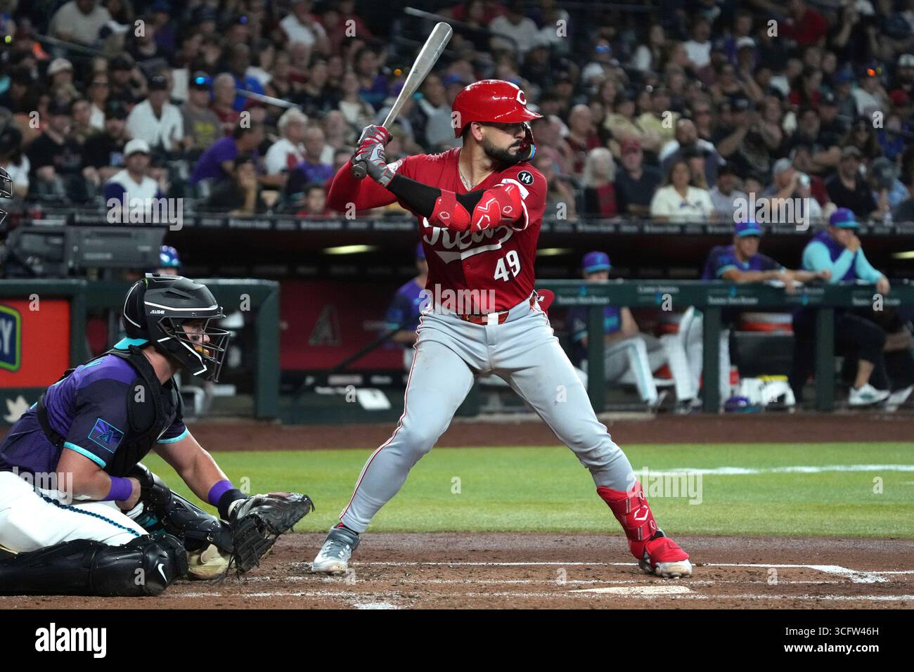 Cincinnati Reds catcher Will Banfield (49) hits against the Arizona ...