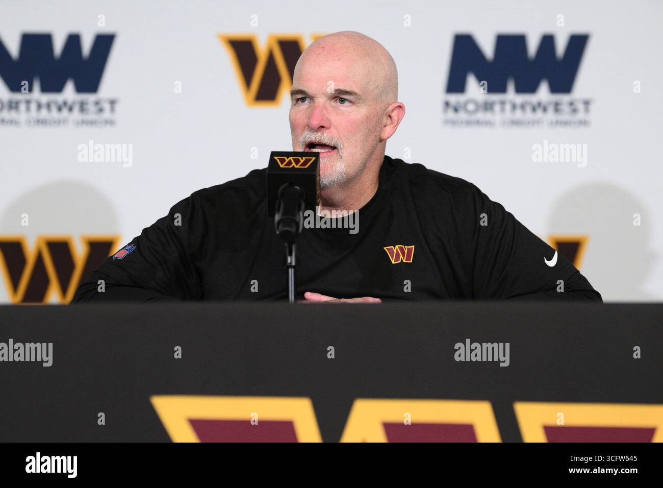 Washington Commanders head coach Dan Quinn speaks during a news ...