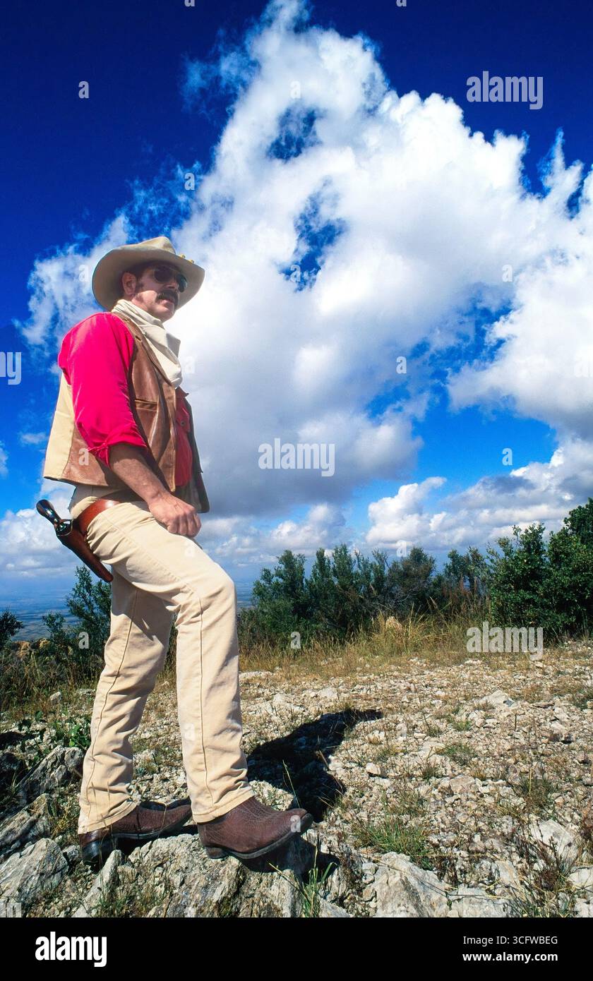 A single adult cowboy gives a tour of the Dragoon Mountains in southern ...