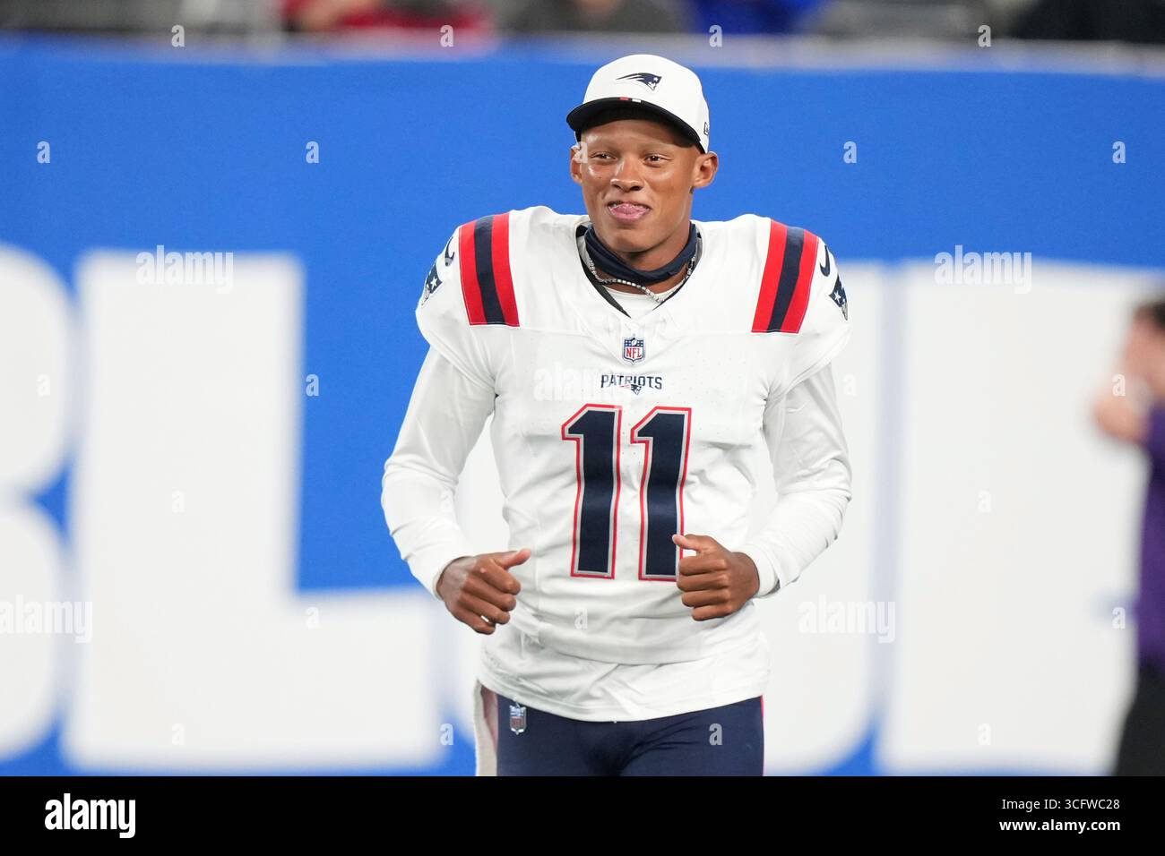 New England Patriots quarterback Joshua Dobbs (11) enters the field ...