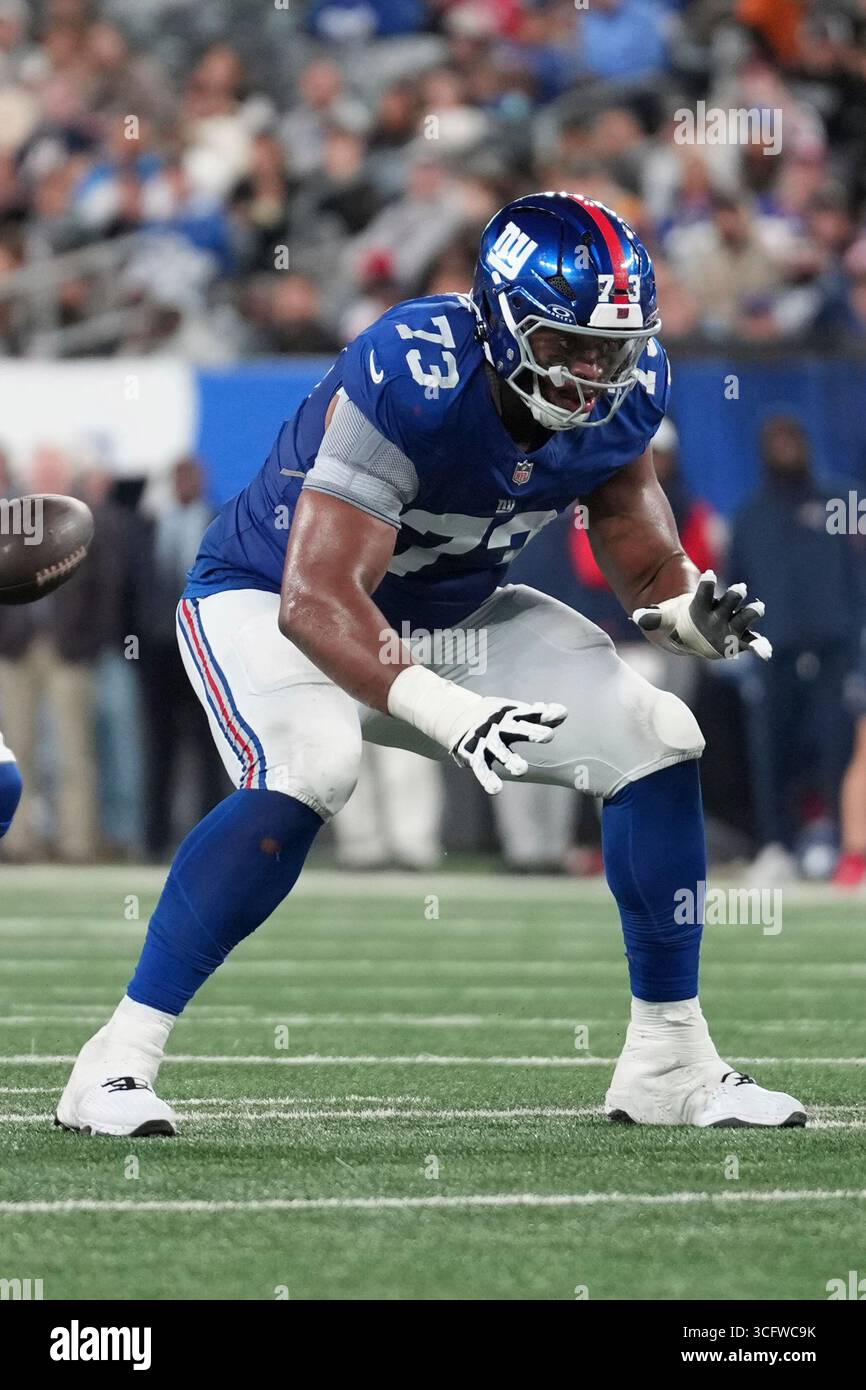 New York Giants offensive tackle Evan Neal (73) protects the pocket ...