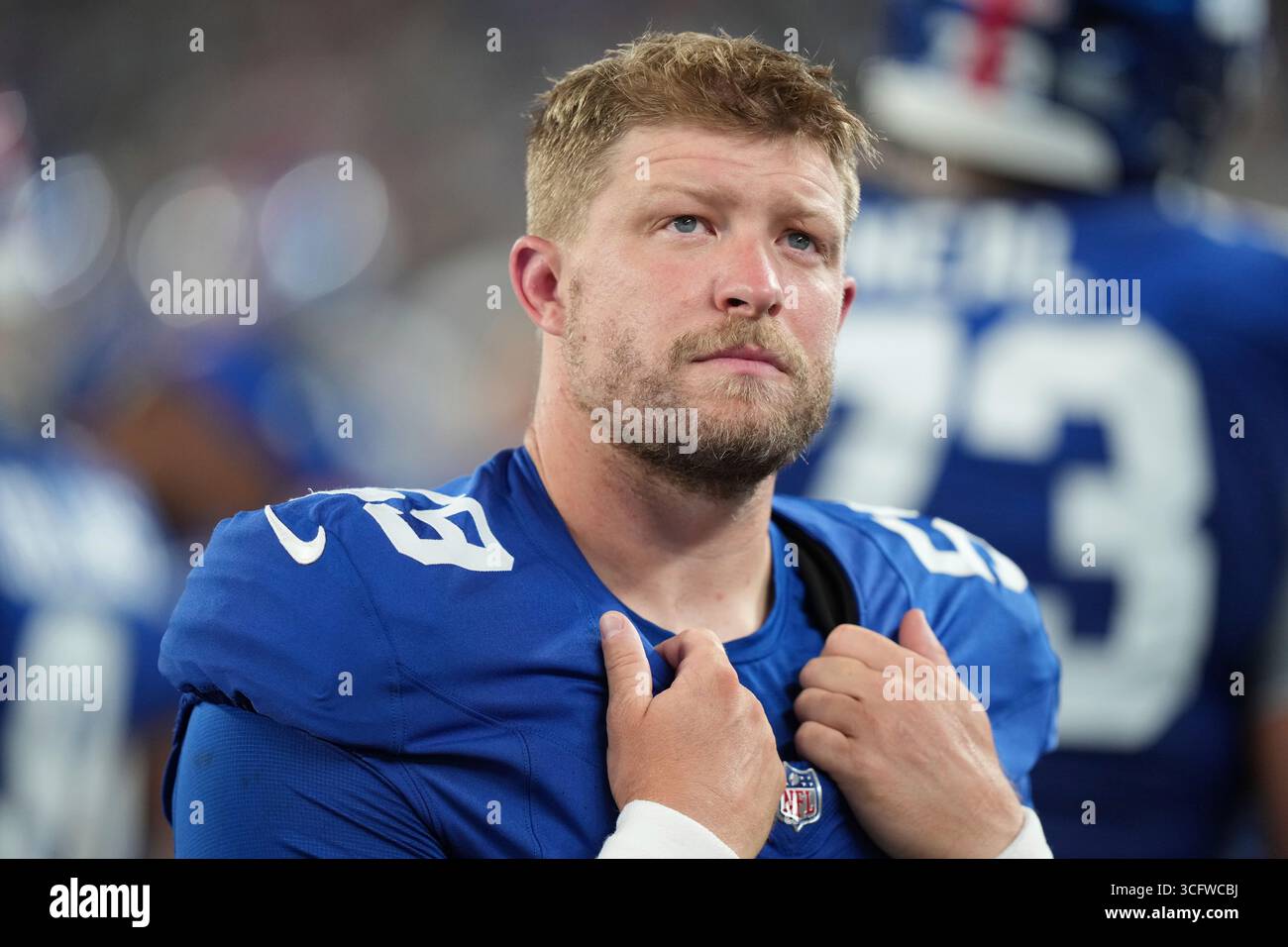 New York Giants long snapper Casey Kreiter (59) watches the monitor ...