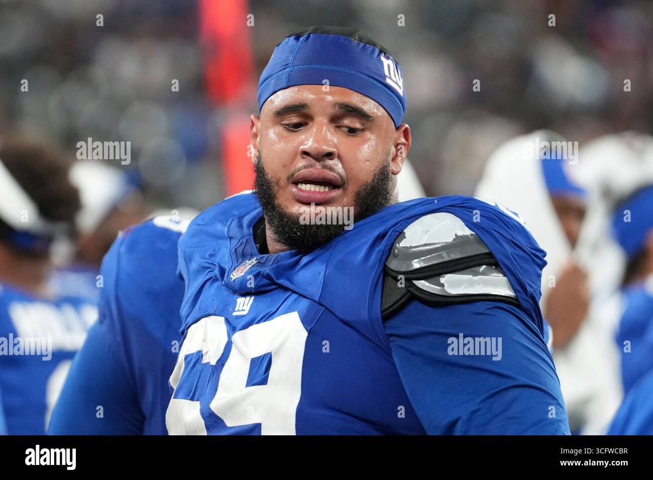 New York Giants defensive tackle Cory Durden (69) talks to teammates on ...
