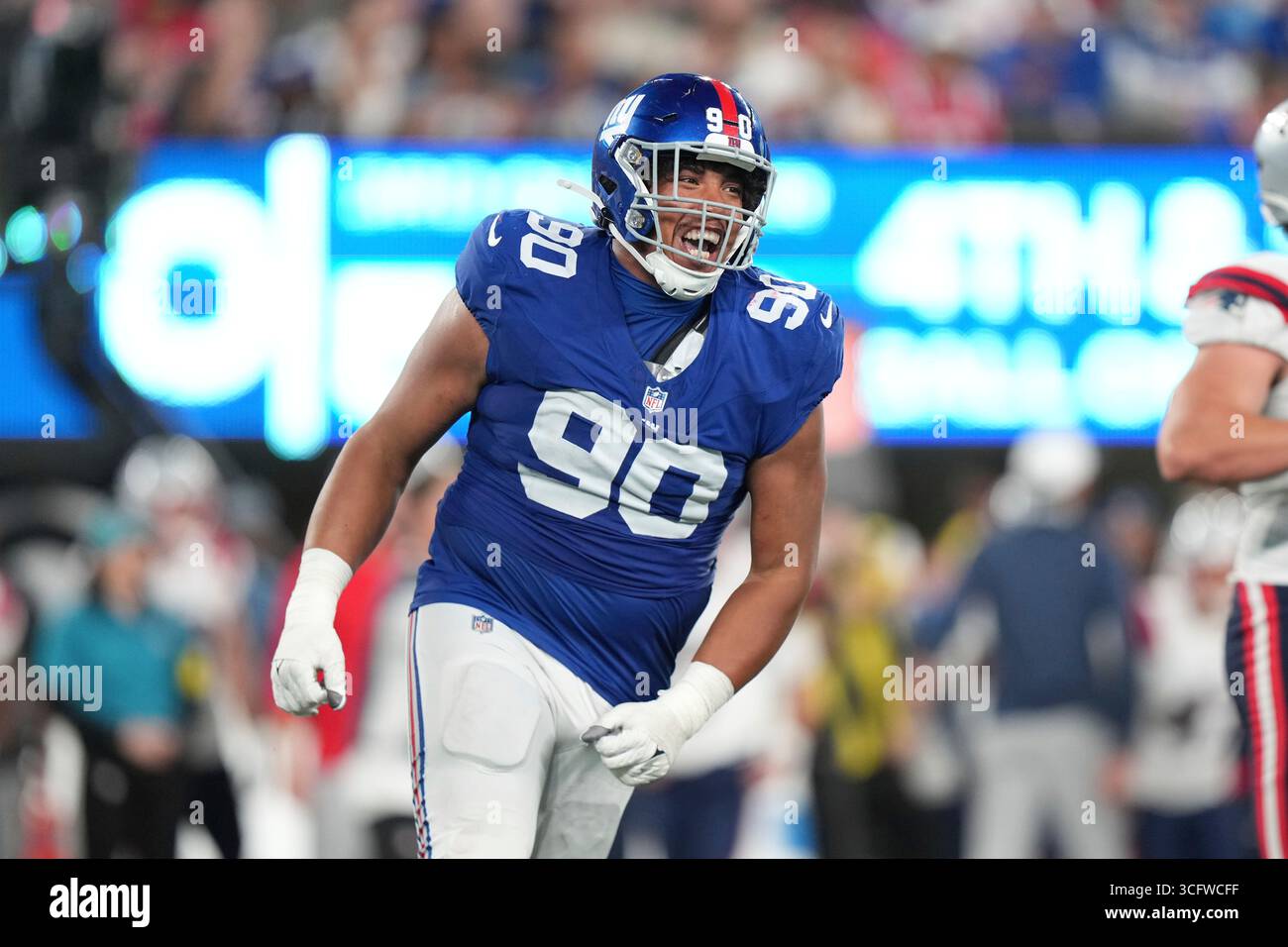 New York Giants defensive end Elijah Garcia (90) celebrates after a ...