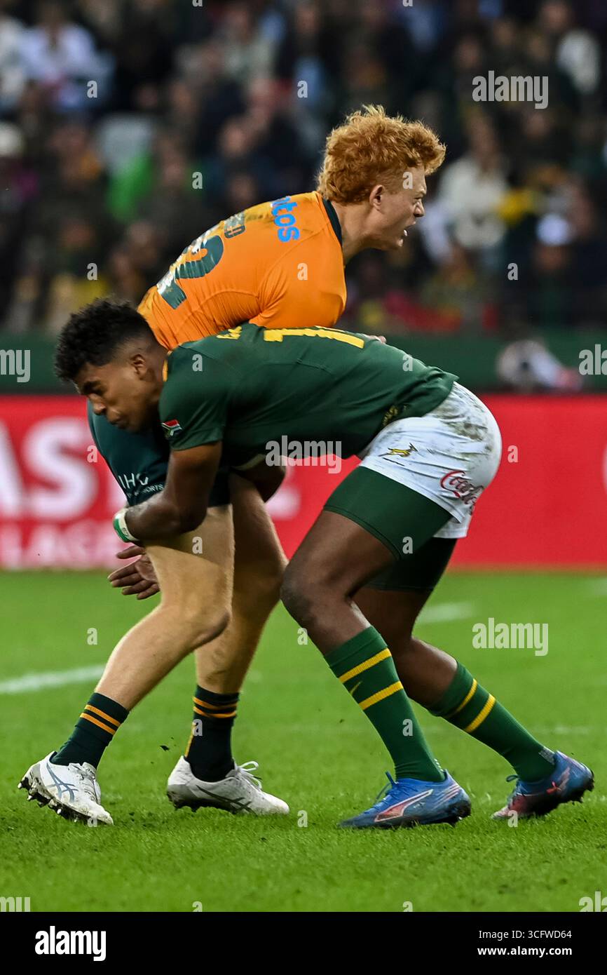 Tane Edmed of Australia tackled by Canan Moodie of South Africa during ...