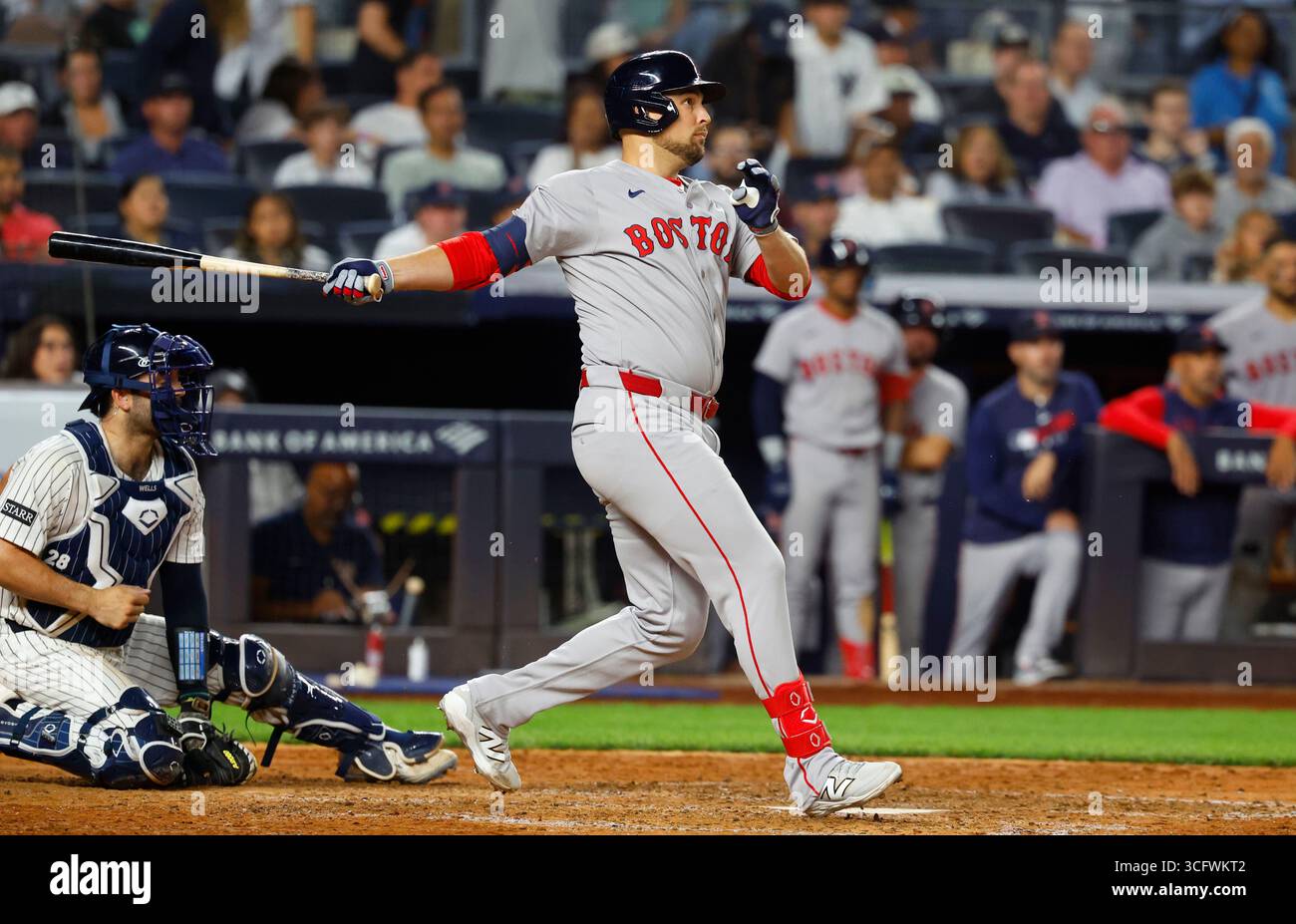 Boston Red Sox's Nathaniel Lowe follows through on an RBI single ...