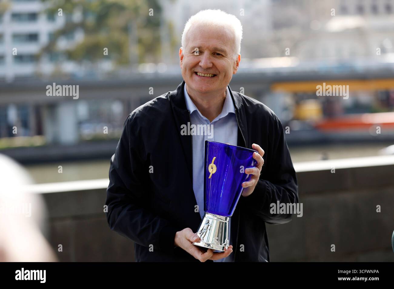 Andrew Gaze poses for his photo with his trophy during the announcement ...