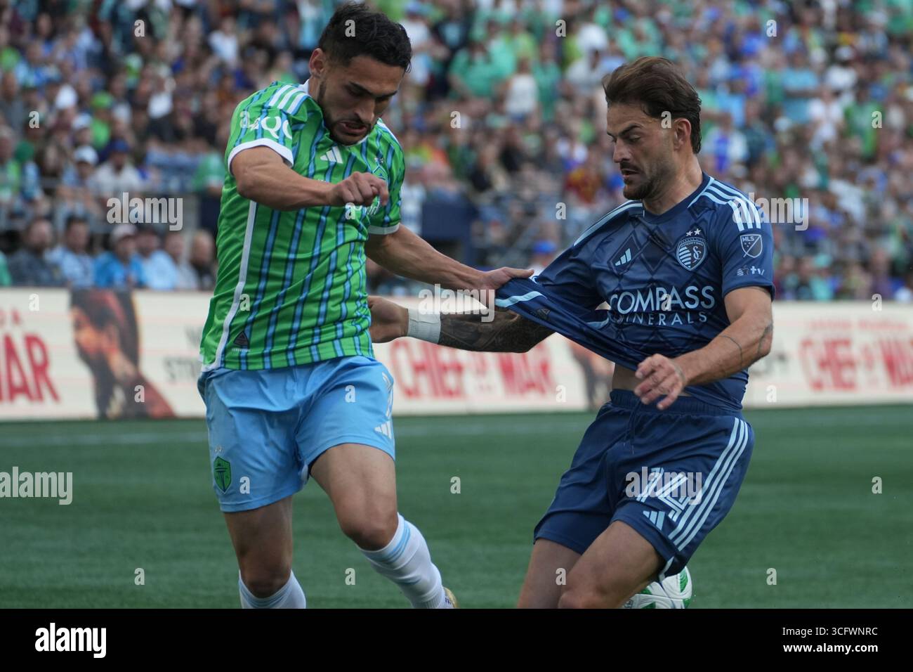 Seattle Sounders FC midfielder Cristian Roldan (7) pulls the shirt of ...