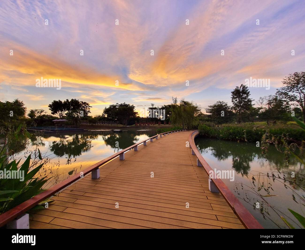Sunset over river pathway hi-res stock photography and images - Alamy