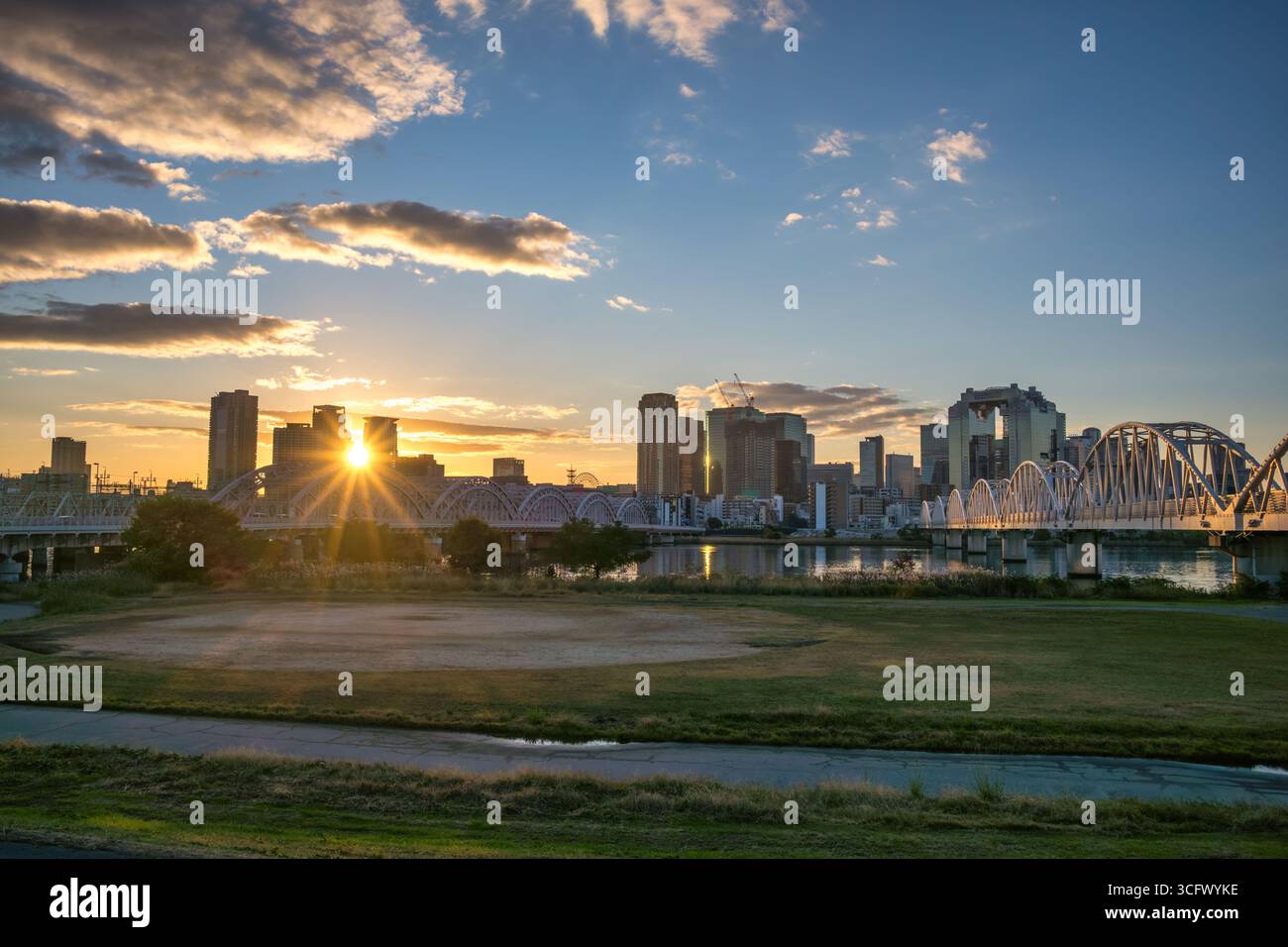 Osaka Japan, city skyline sunrise at Yodo River and Juso Bridge Stock ...