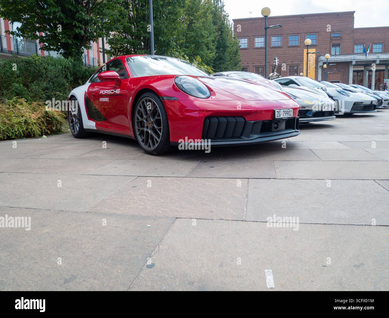 Cremona, Italy August 22nd 2025 Shiny red Porsche 911 with a custom ...