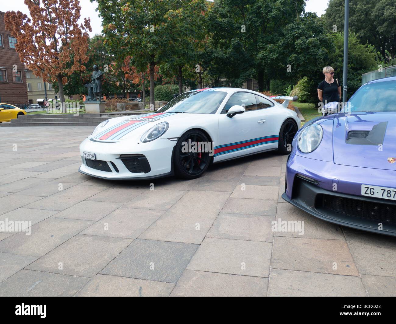 Cremona, Italy August 22nd 2025 Two Porsche 911 sports cars, one white ...