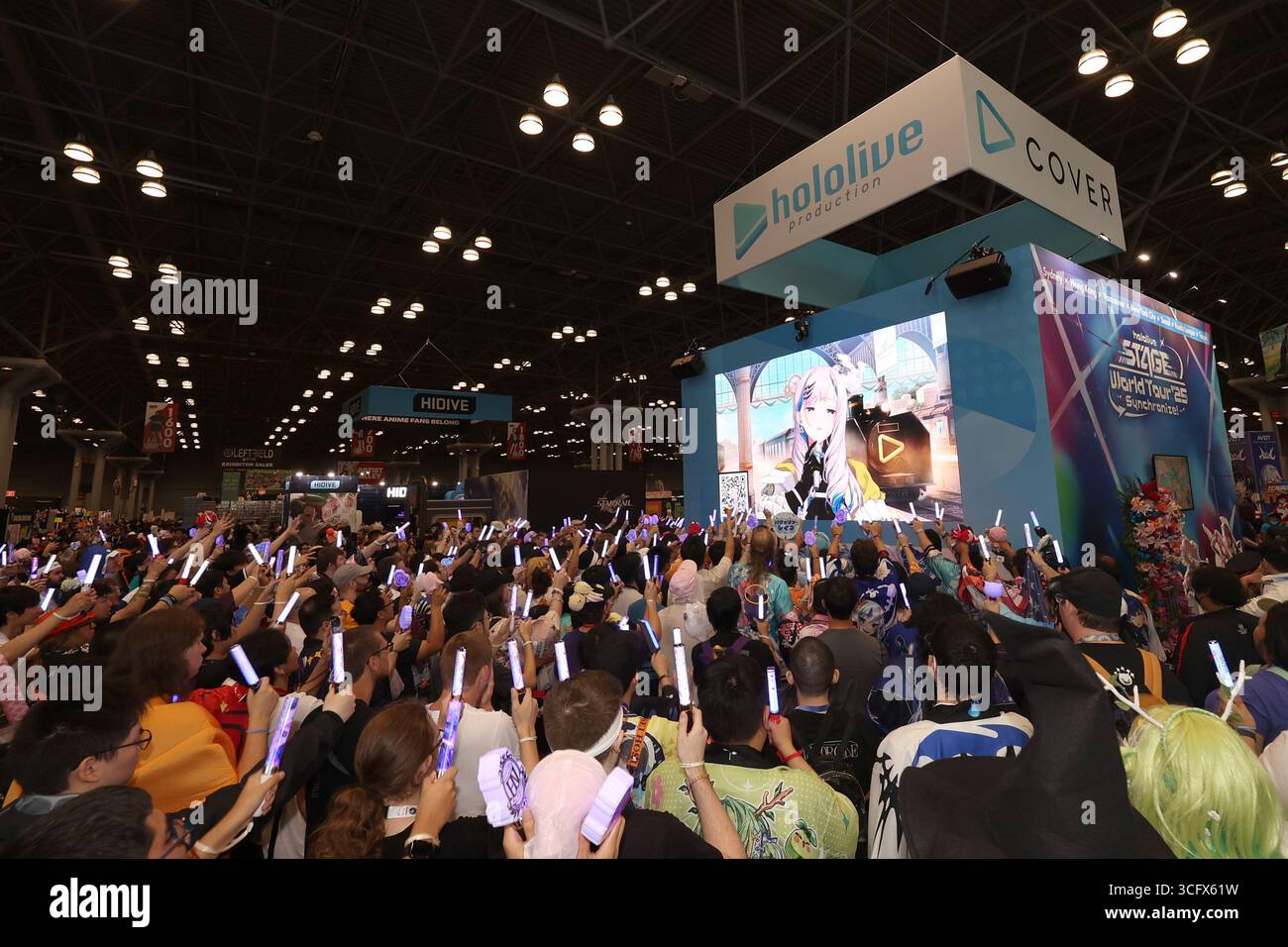 Cosplayers gather for a concert presented by Hololive Productions at ...