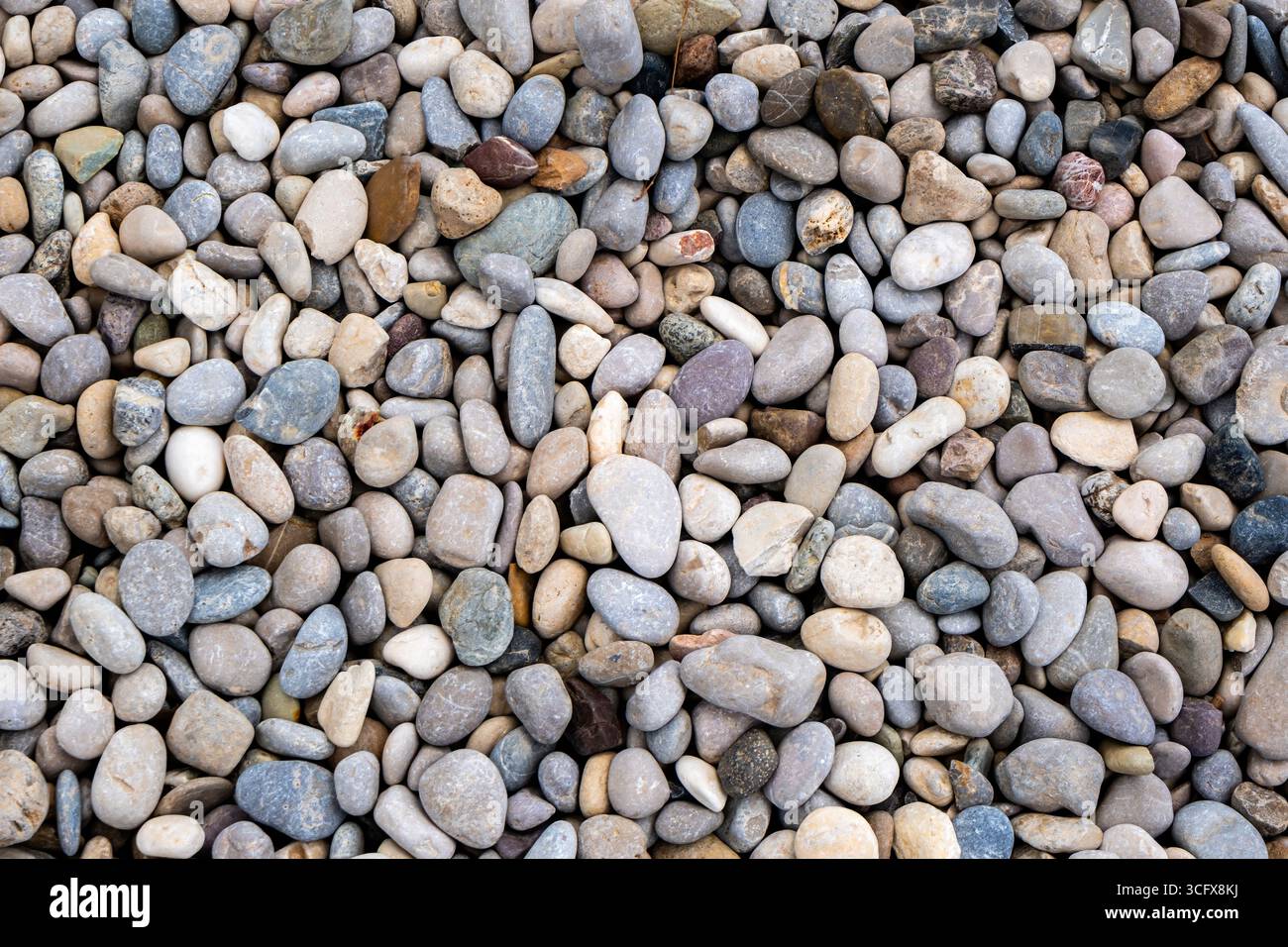 Diverse collection of stones in natural colors. collage of sea shore ...