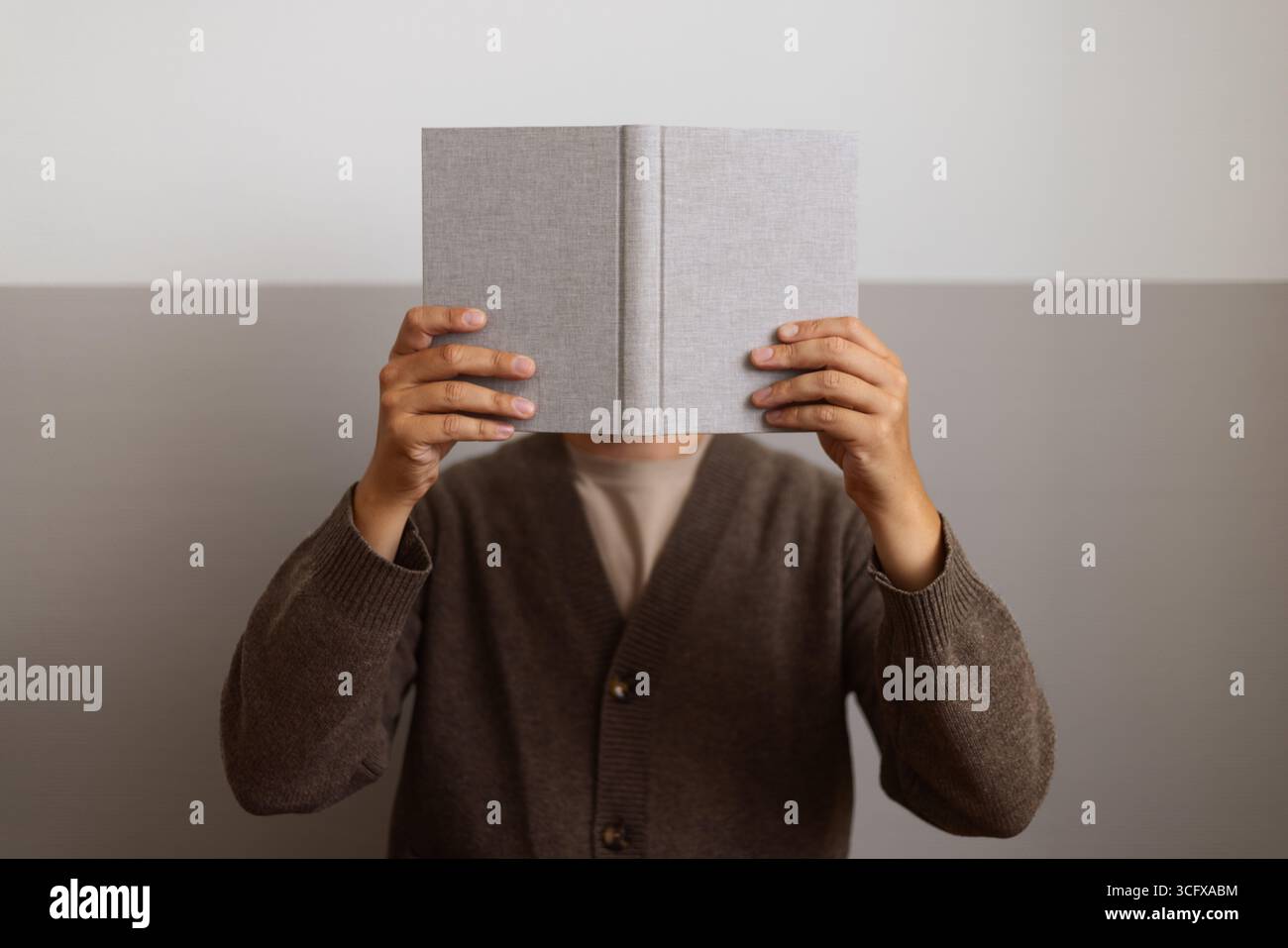 Open book neutral face hi-res stock photography and images - Alamy