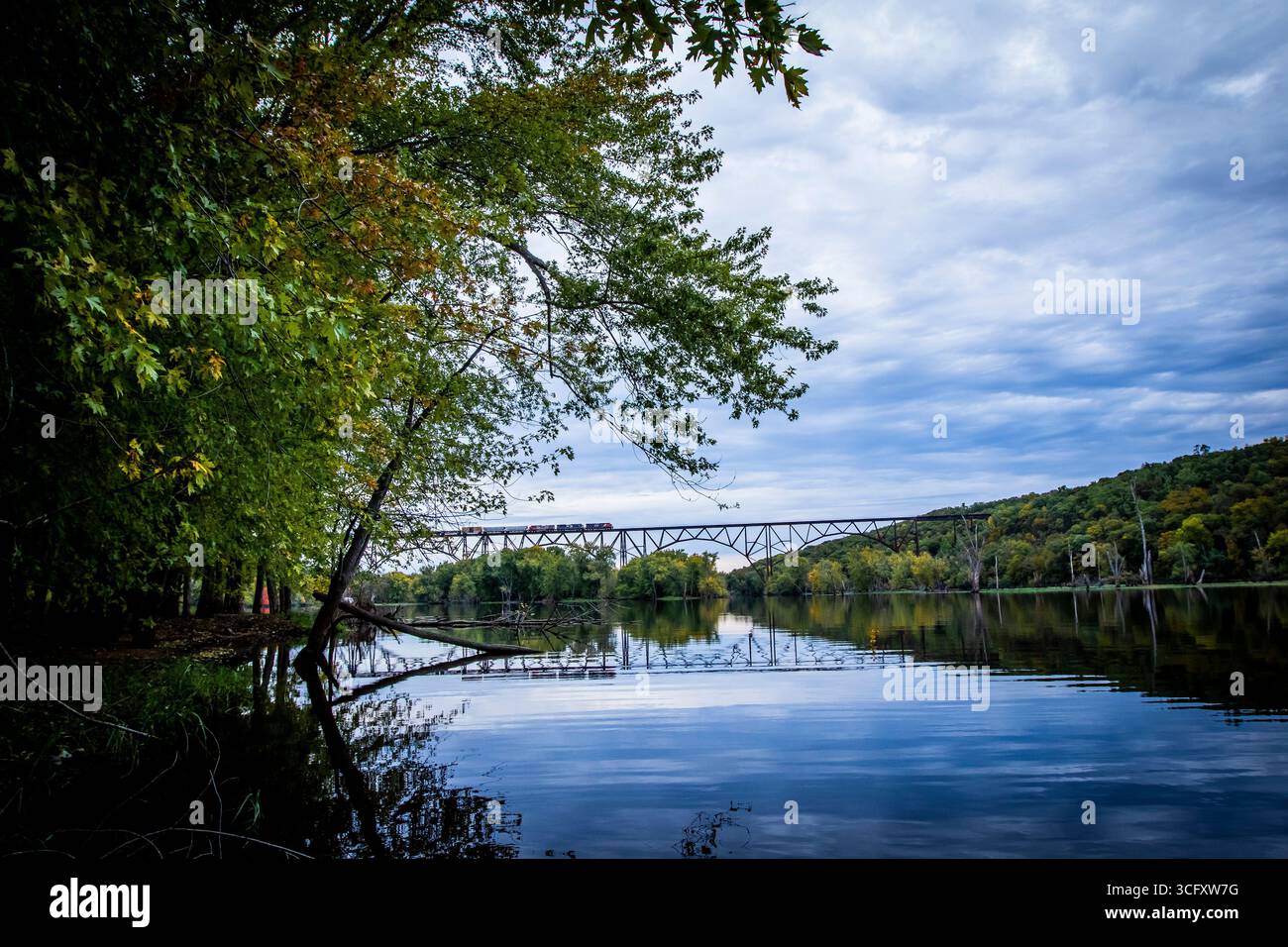 Train going over bridge across hi-res stock photography and images - Alamy