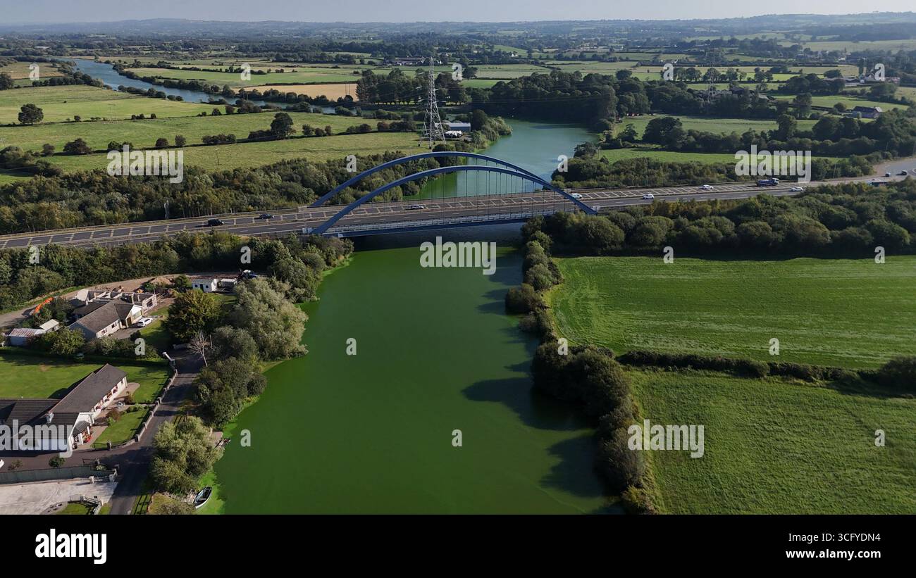 Blue green algae on the river bann where it meets lough neagh near the ...