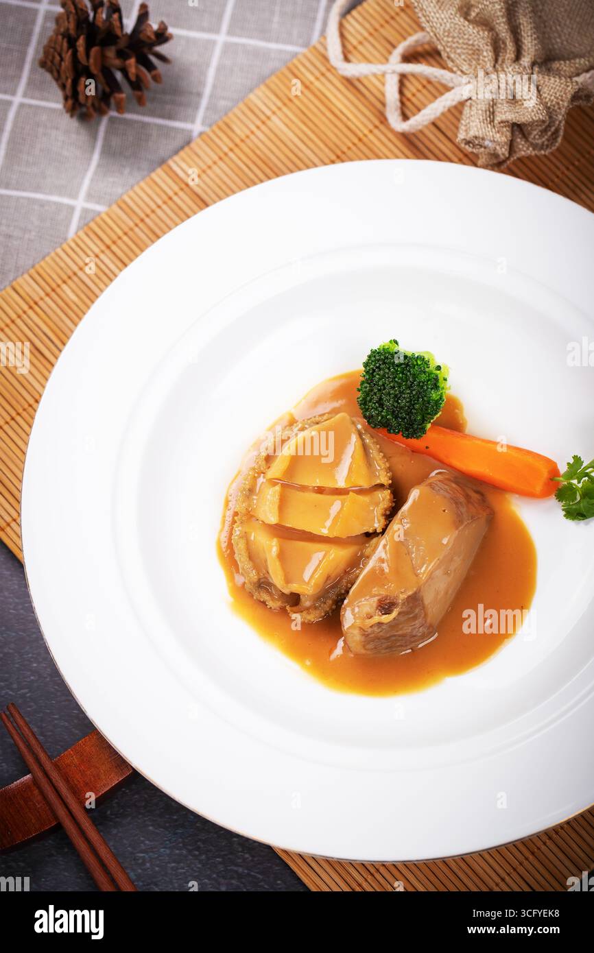 Braised Abalone with King Oyster Mushroom in Rich Brown Sauce Stock ...