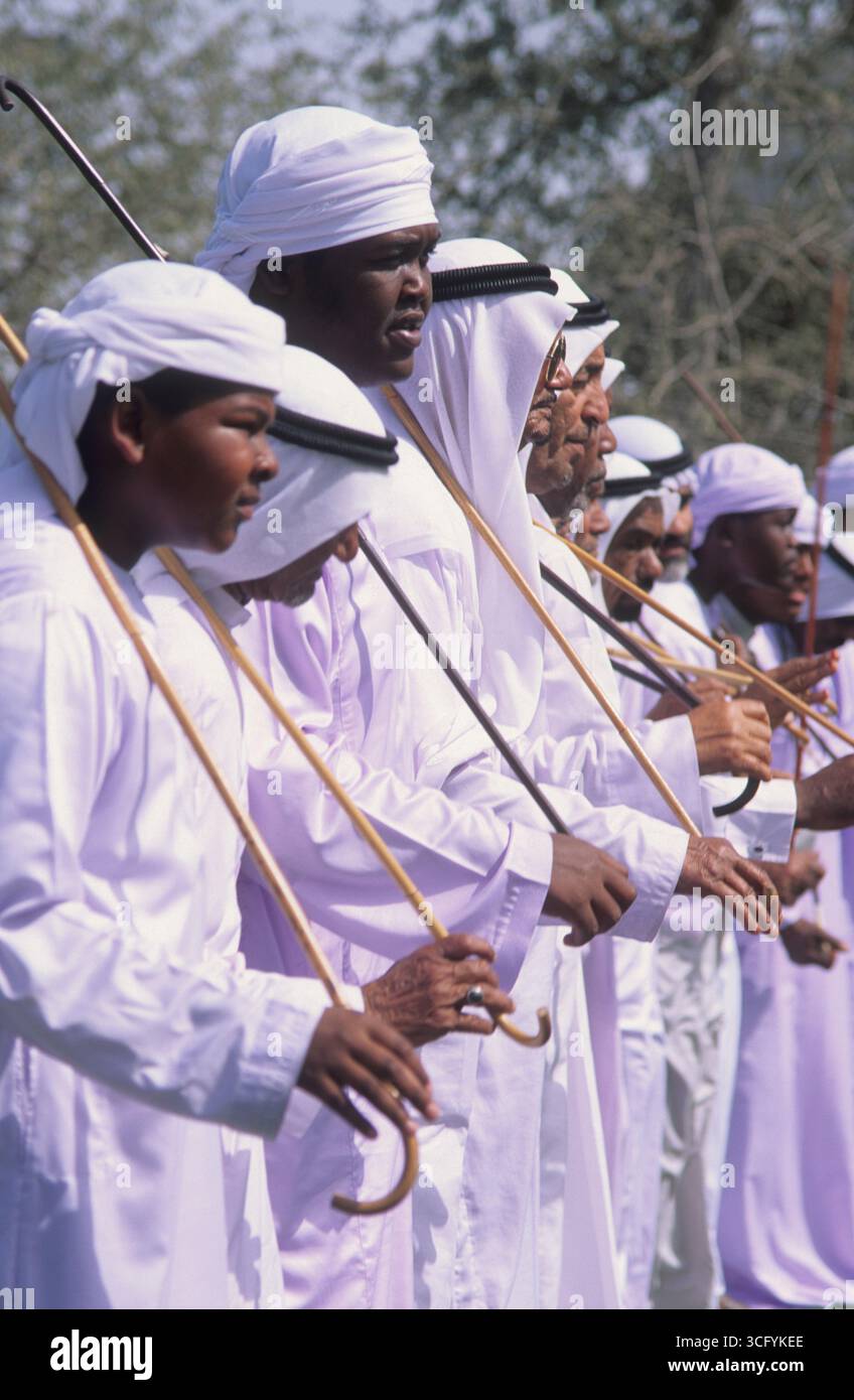 Abu Dhabi, men in traditional dance known as Al Ayyala (or Yowlah Stock ...