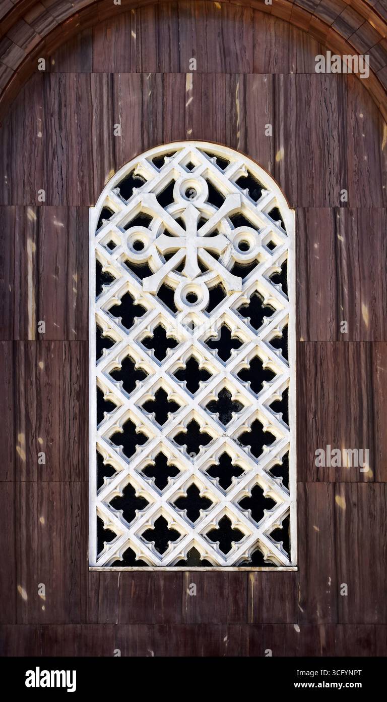 Window with decorative grille on church facade in Tijuca neighborhood ...