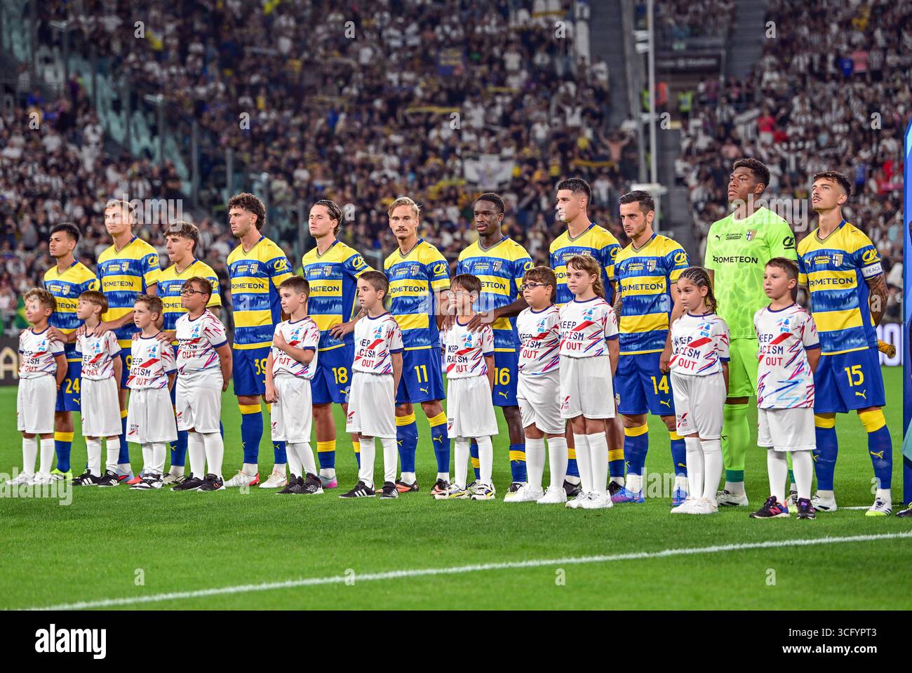 Turin, Italy. 24th, August 2025. The players of Parma line up for the ...