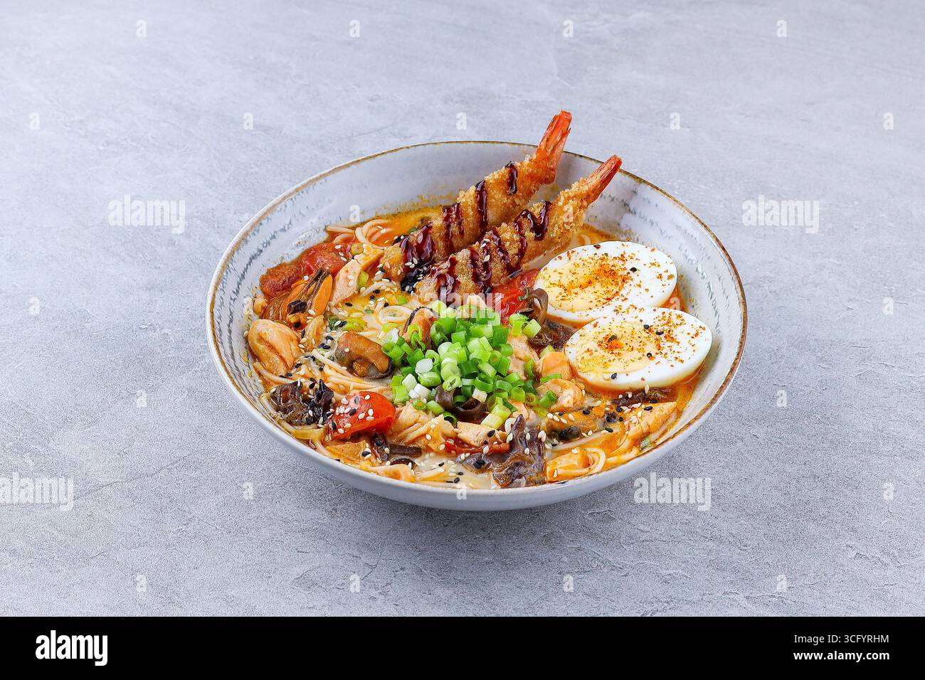Authentic Japanese ramen with crispy fried shrimp tempura, boiled egg ...