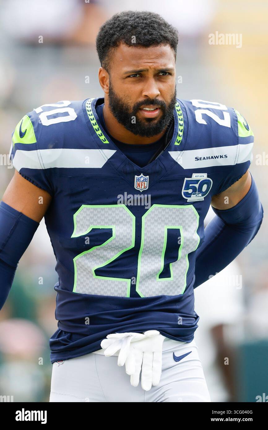 Seattle Seahawks safety Julian Love (20) walks on the field before a ...