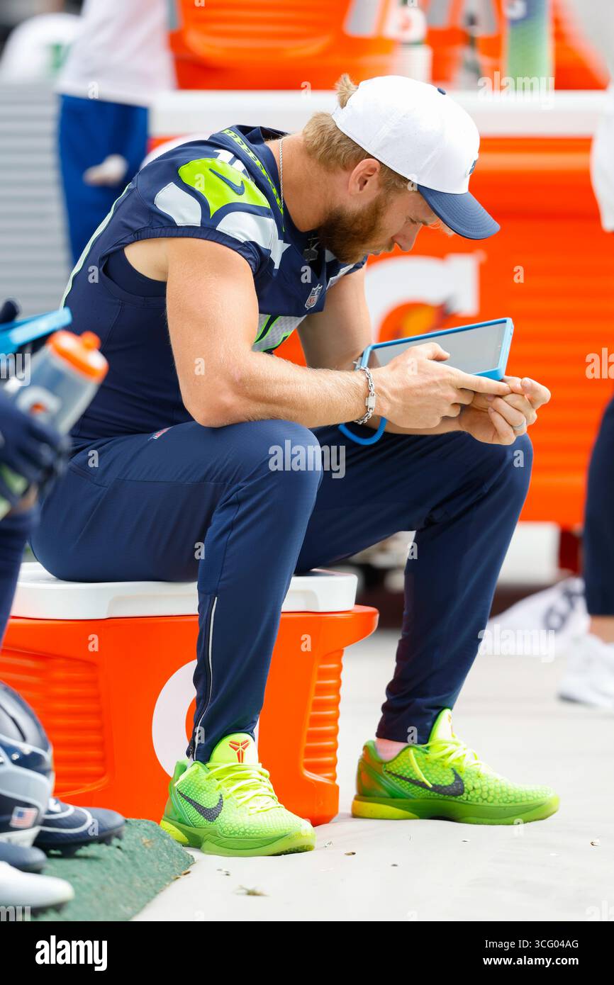 Seattle Seahawks wide receiver Cooper Kupp (10) studies a computer from ...