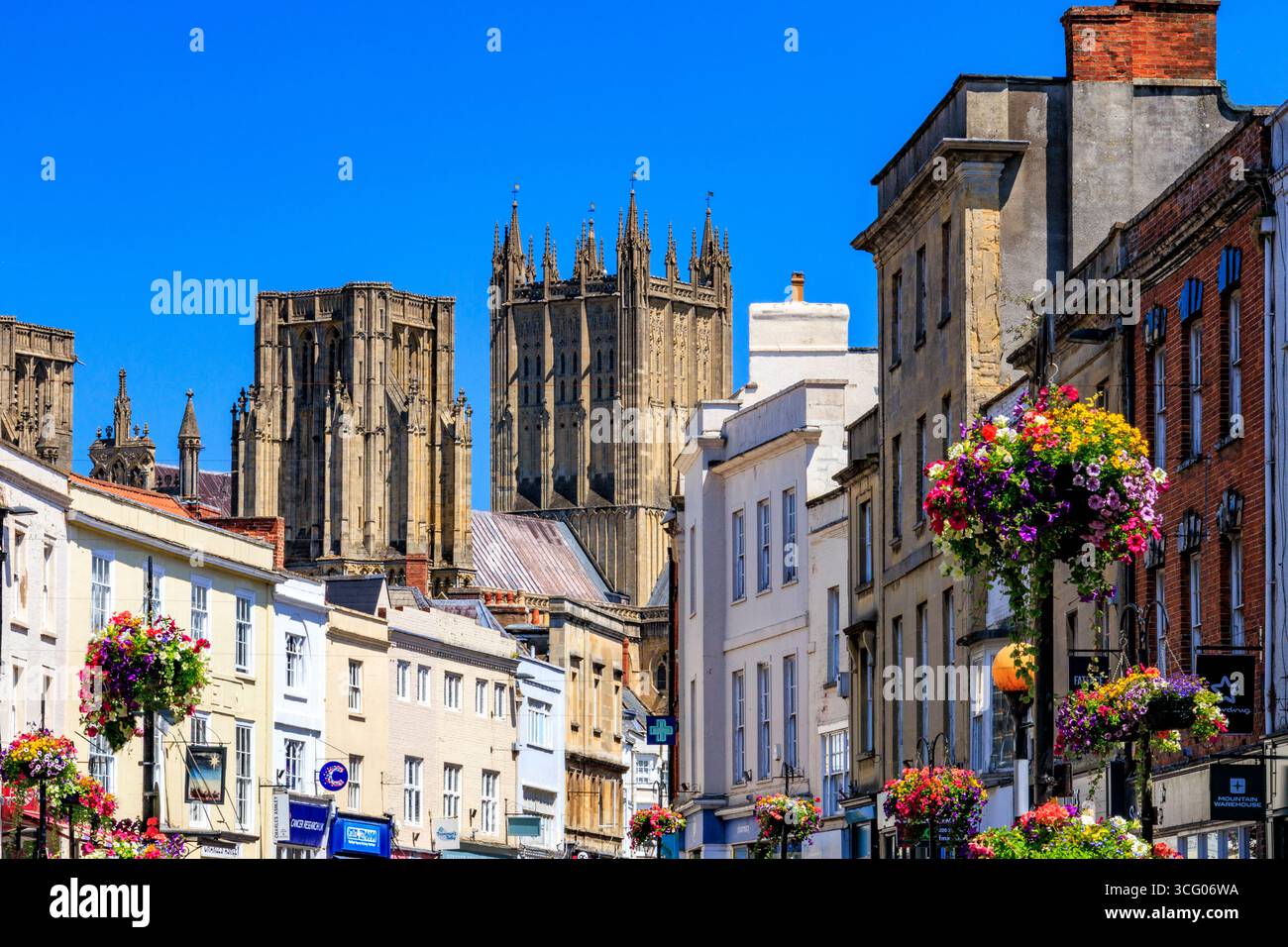 Colourful floral displays and architecture in the High Street with the ...