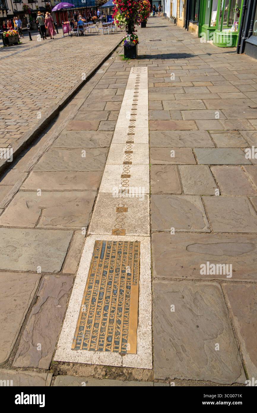 Commemorative pavement plaque recording Mary Rand's world record long ...
