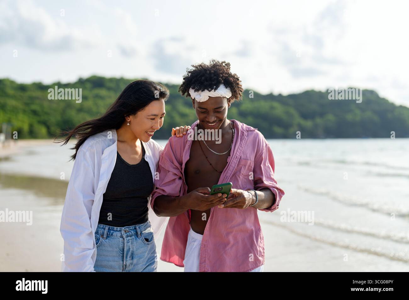 Diverse couple connected embracing hi-res stock photography and images ...