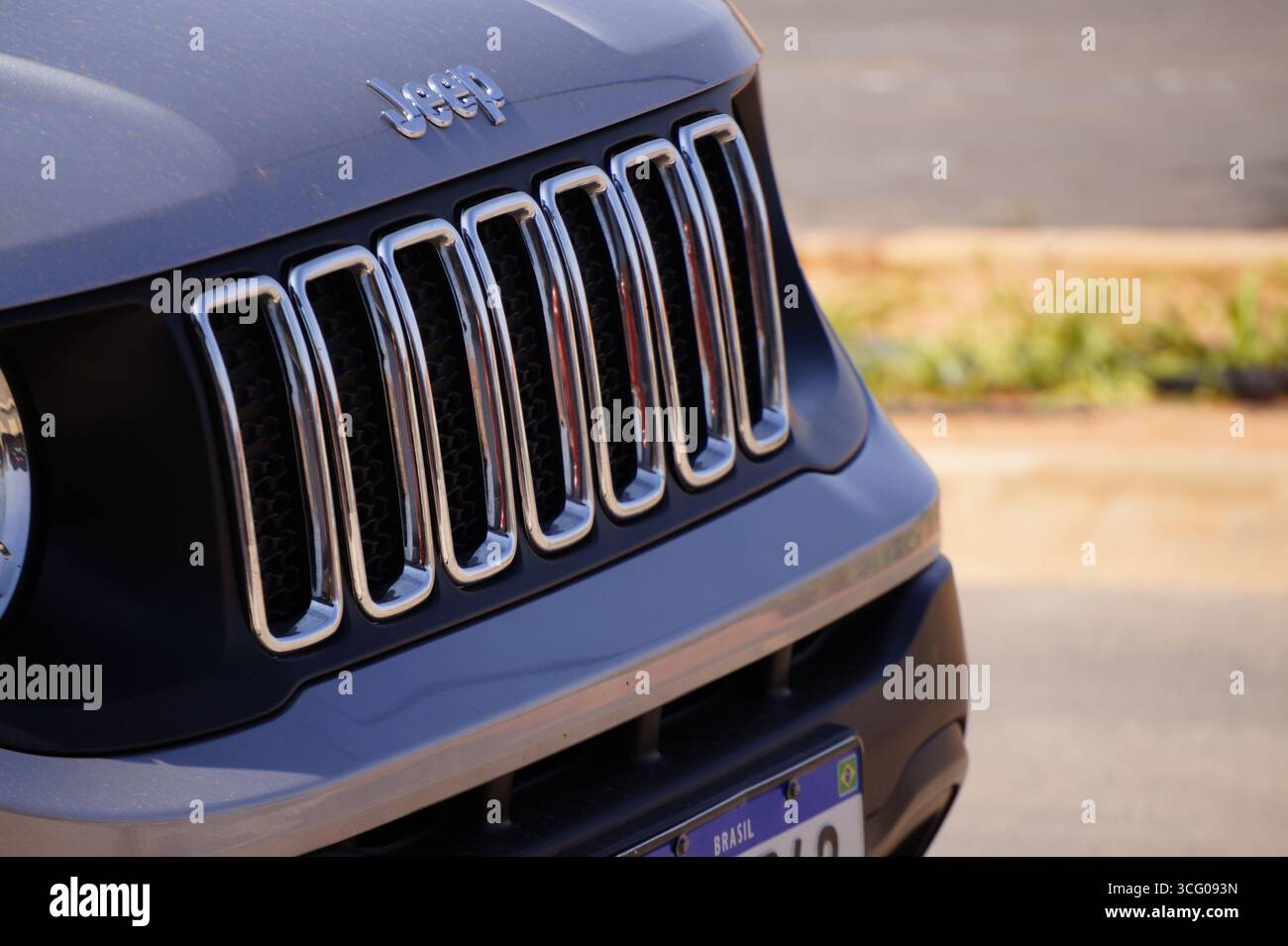 Front of a Jeep car with a blurred background Stock Photo - Alamy
