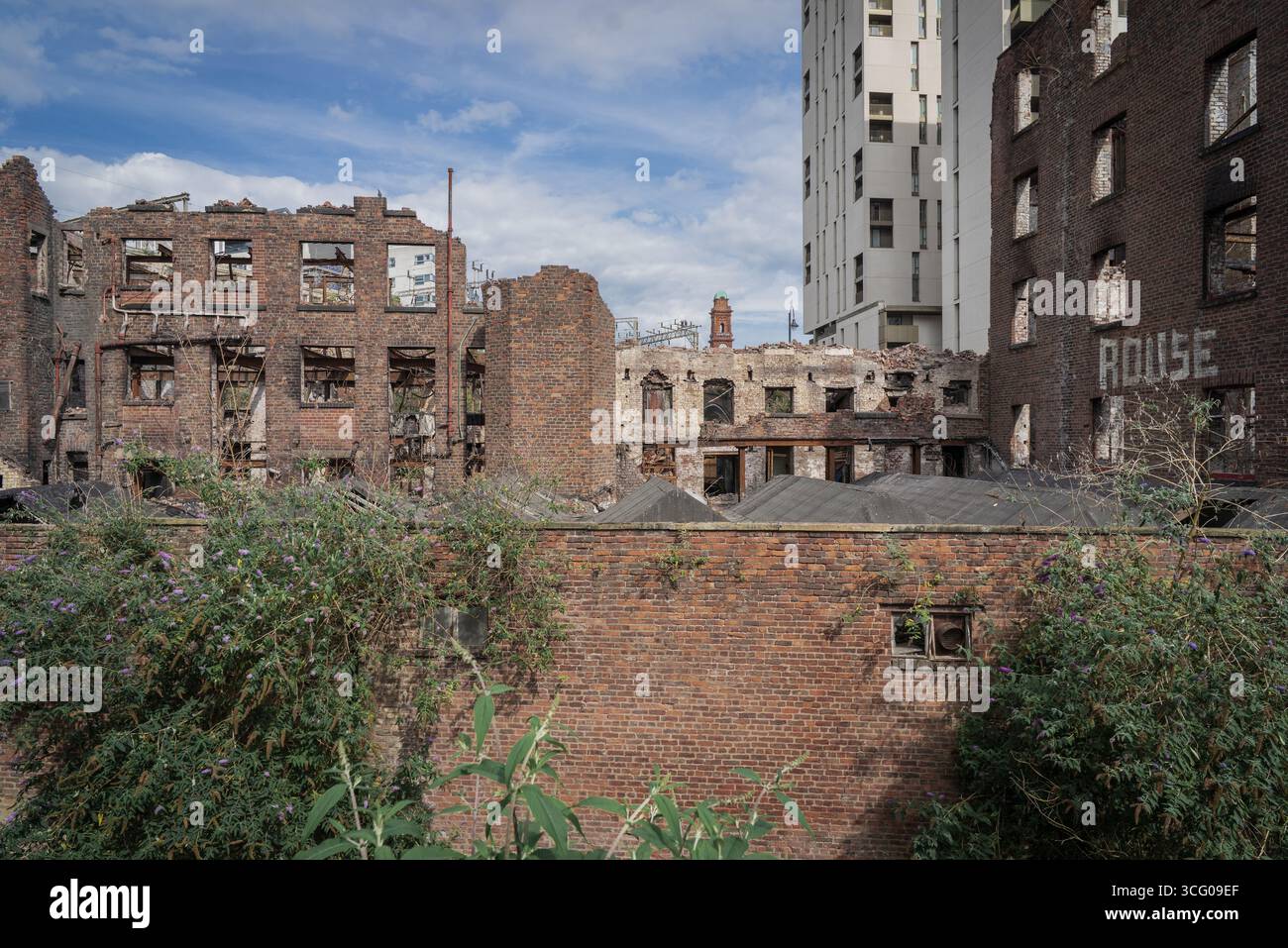 The burnt out ruins of the Hotspur Press building, Georgian mill in ...