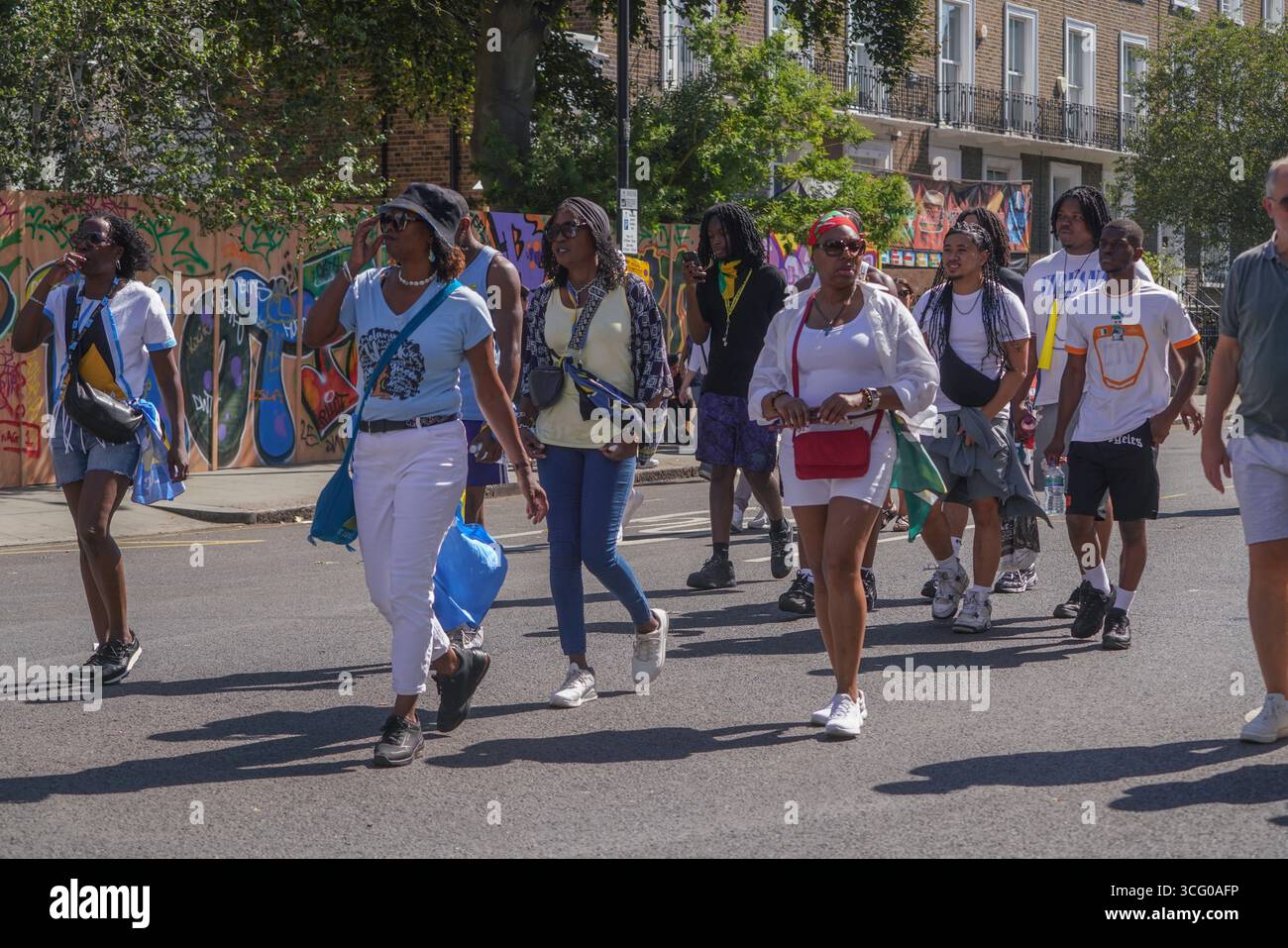 London, UK. 25 August 2025. Revellers arrive at the Notting Hill ...