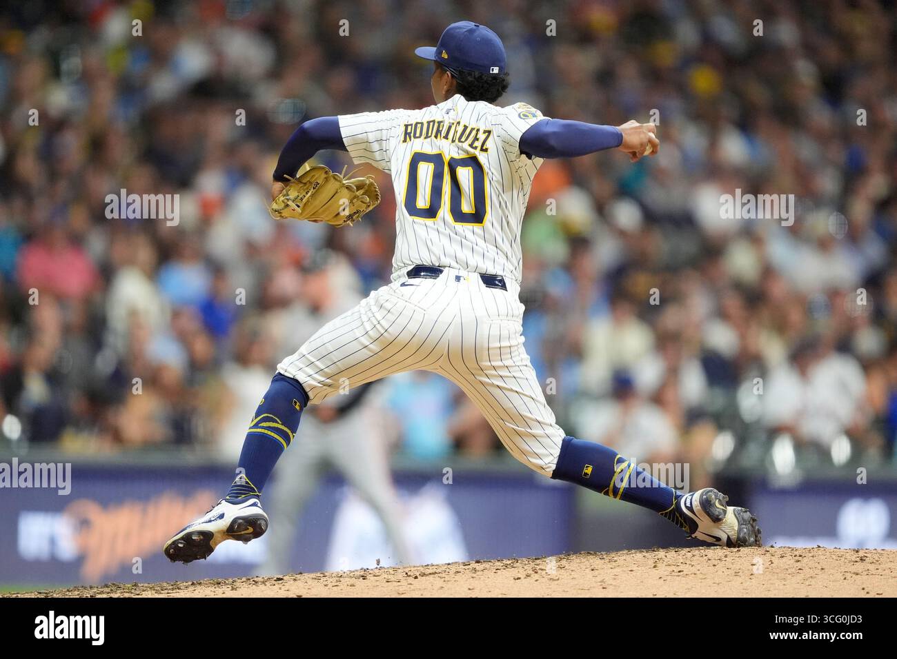 Milwaukee Brewers' Carlos Rodriguez pitches during a baseball game ...
