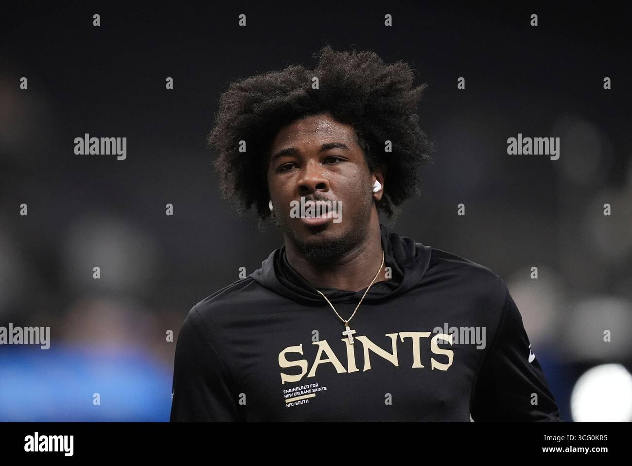 New Orleans Saints defensive end Chris Rumph II warms up before a ...