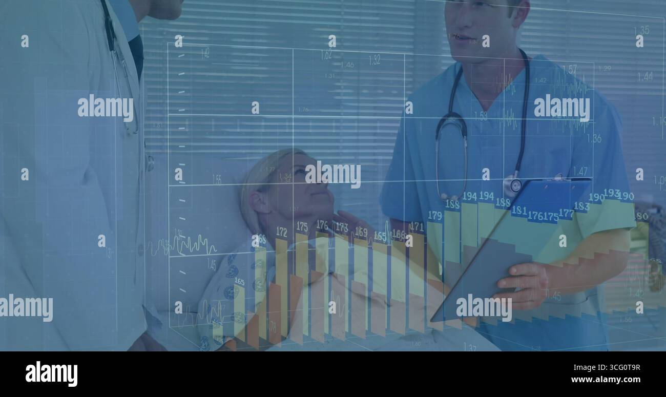 Examining female patient while medical staff reviewing charts in ...