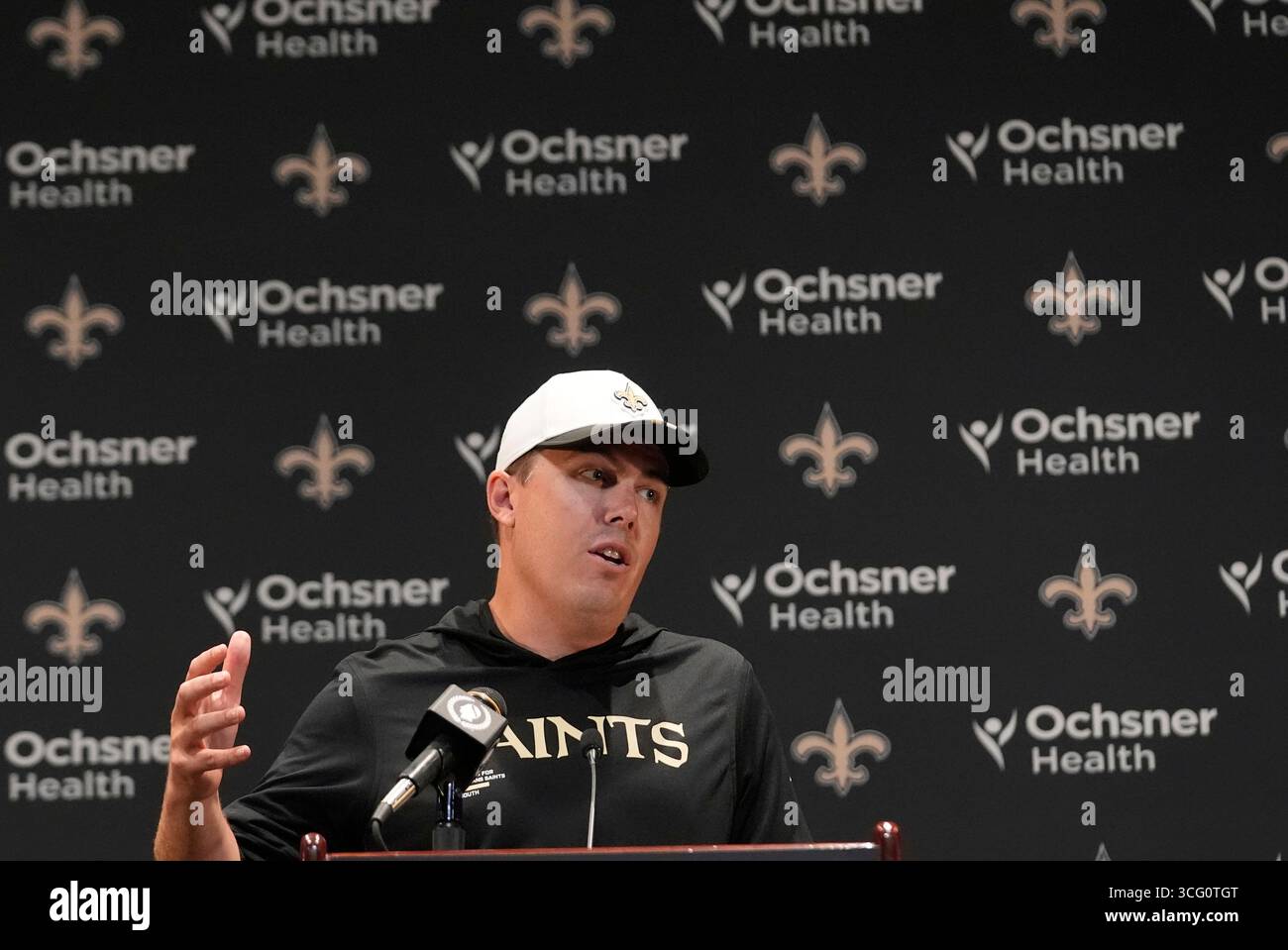 New Orleans Saints head coach Kellen Moore talks to reporters after a ...