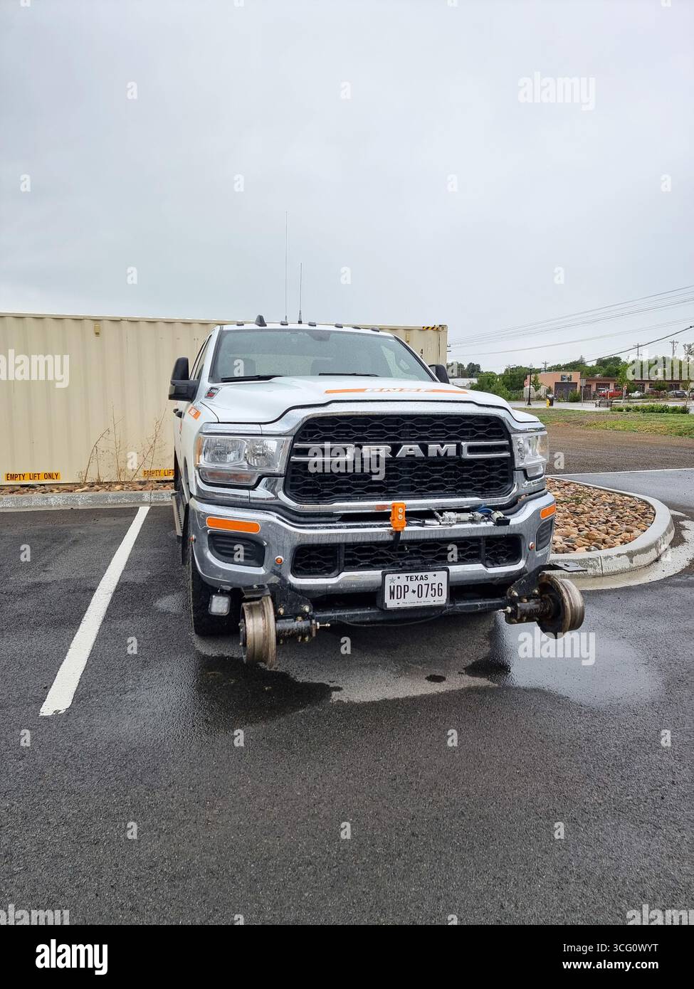 White road-rail vehicle, dual-mode vehicle of the BNSF Railway ...